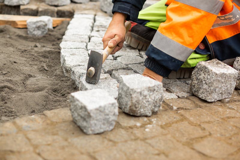 Maintenance Work on Paving with Interlocking Paving Stones ...