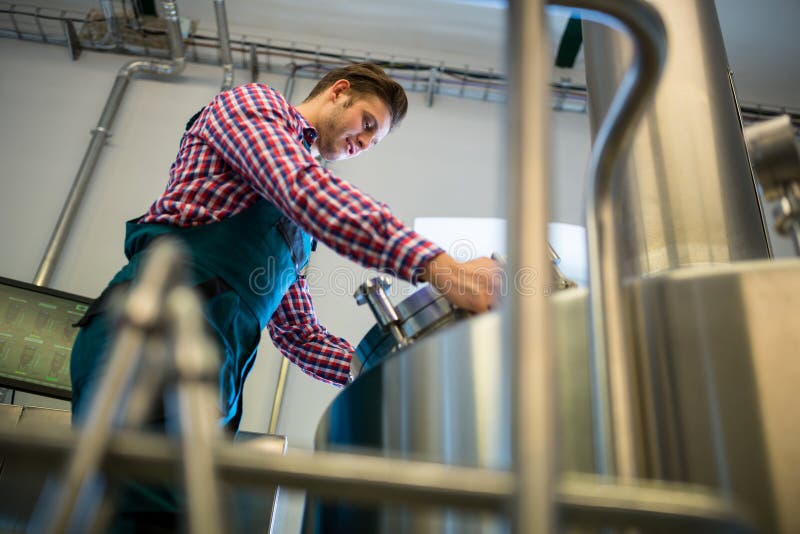 Maintenance Worker Working at Brewery Stock Image - Image of attentive ...