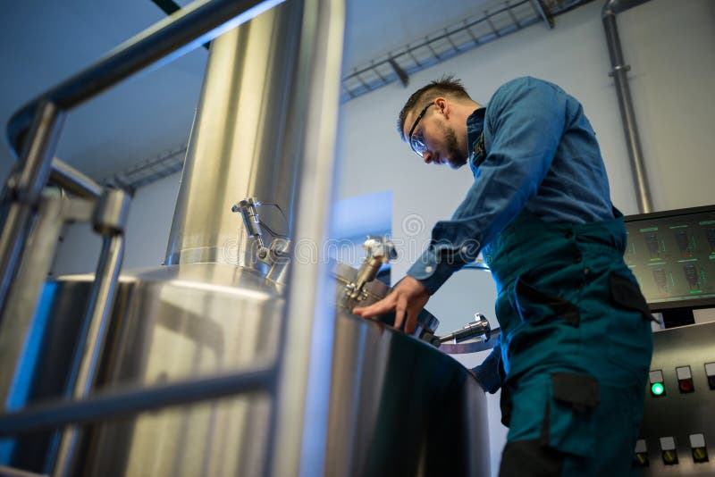 Maintenance Worker Working at Brewery Stock Photo - Image of drink ...