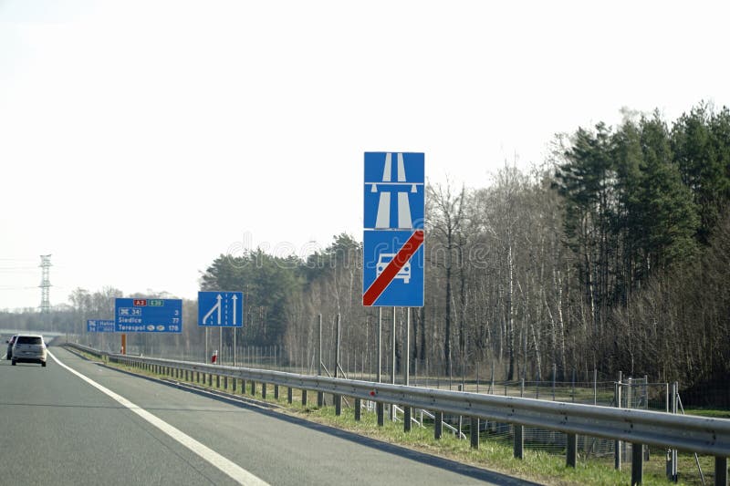 End of Expressway and Beginning of a Highway Traffic Sign Editorial ...