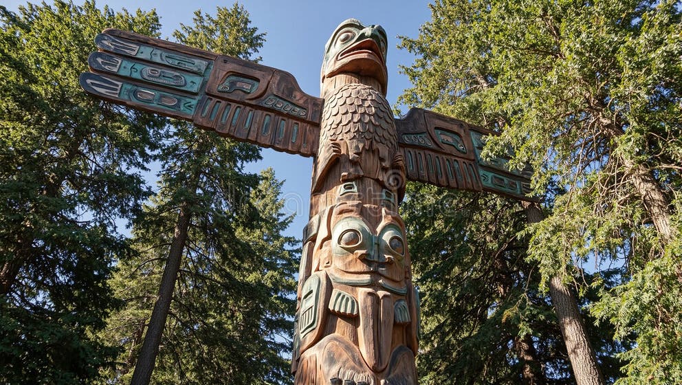 Majestic Cedar Totem Pole with Mythical Creatures Gleaming in Sunlight ...