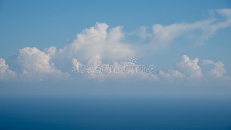 Majestic Clouds Hovering Above Tranquil Ocean Horizon Stock Photo - Image of tranquil, ethereal ...