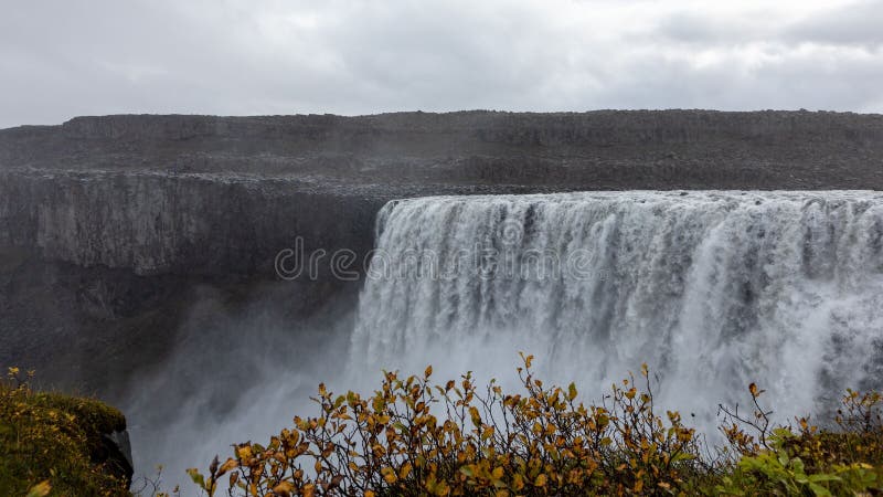 Majestic Dettifoss Waterfall in Iceland Cascading Over Rugged Cliffs ...