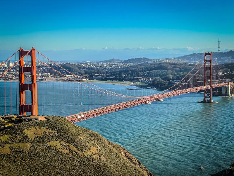 The Majestic Golden Gate Bridge Underneath a Blue Sky Stock Image ...