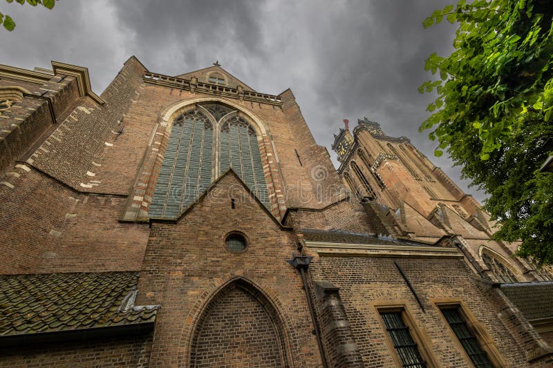 A Majestic Gothic Church Under a Dramatic Cloudy Sky. the Intricate ...
