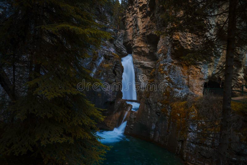 Majestic Long Exposure Shot of the Rocky Waterfall Cascading Down the ...