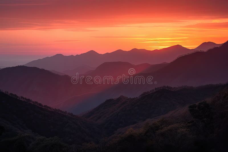 Majestic Mountain Range with Pink and Orange Sunrises and Sunsets Stock ...