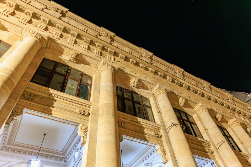 Majestic Night View of Illuminated Classical Building with Columns ...