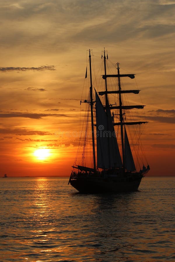 Majestic Sailing Ship Illuminated by the Setting Sun Stock Image ...