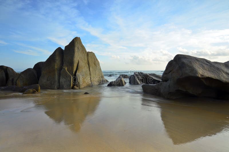 Majestic Sea Stack Rock Formations after Sunrise and Reflections Stock ...