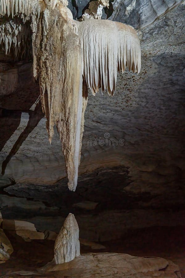 Majestic Stalactite and Stalagmite Formation in a Cave Stock Photo ...