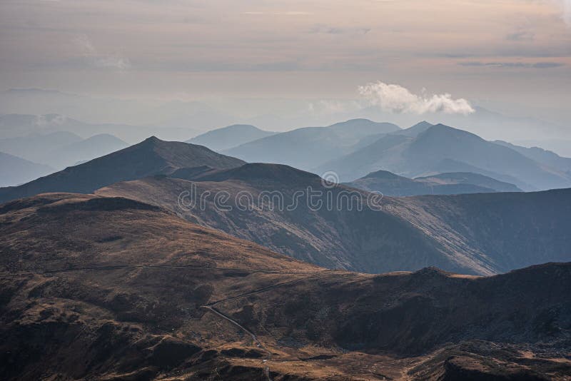 Majestic View of a Vast Mountain Range, with the Sun Shining Brightly ...