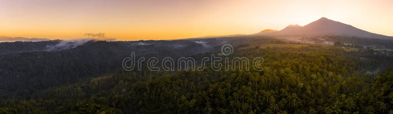 Large volcano at sunrise stock image. Image of sunny - 157746425