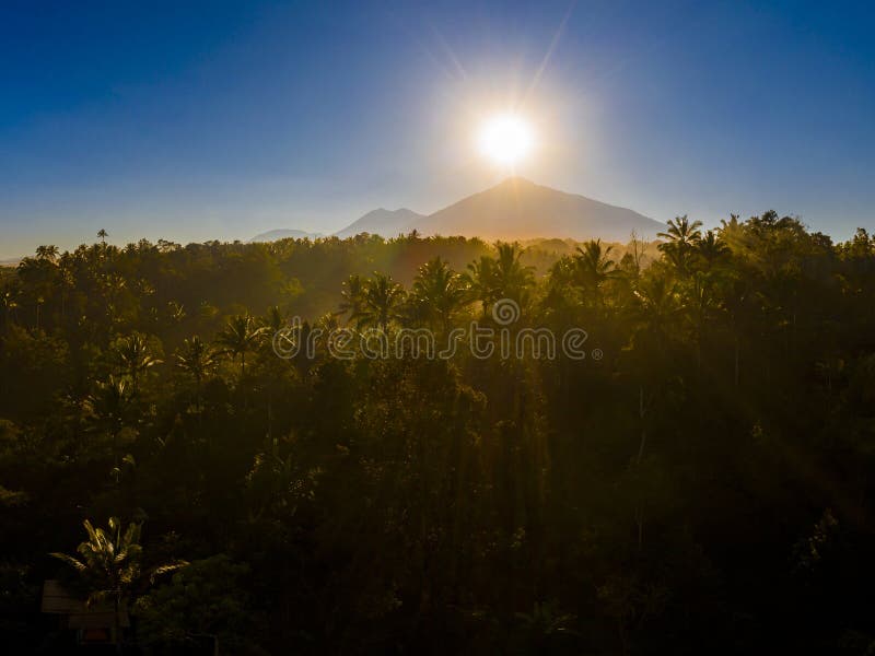 Large volcano at sunrise stock photo. Image of dawn - 157746430