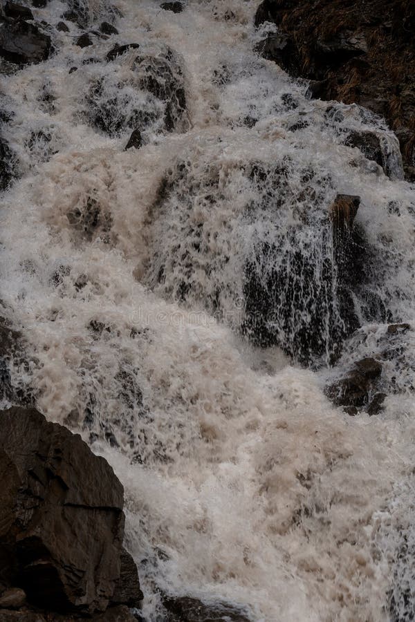 Majestic Waterfall Cascading Over Rocky Terrain Stock Image - Image of ...