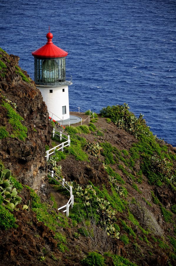 Makapu'u Lighthouse On Cliffside Mountain Top With Stretching Bl Stock ...