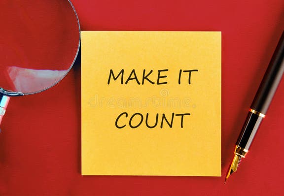 MAKE it COUNT Words Written on a Yellow Sticker on a Red Background ...