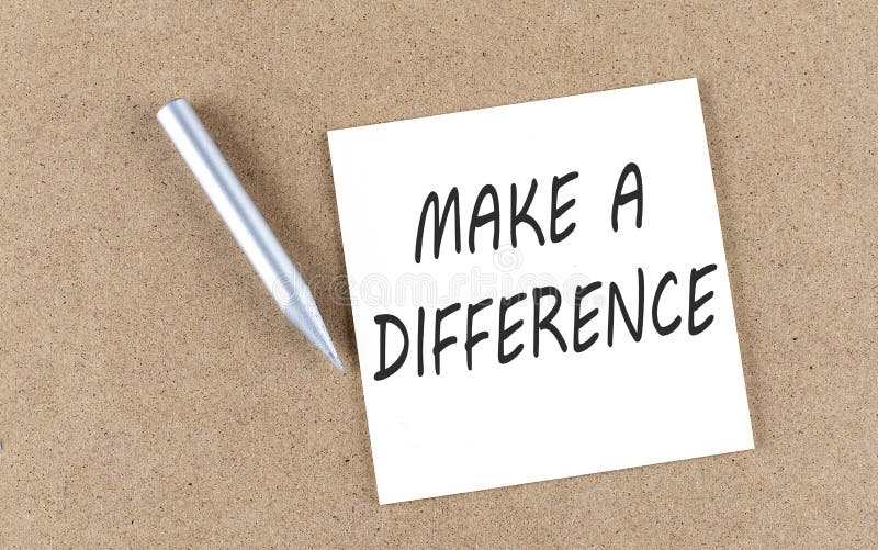 MAKE a DIFFERENCE Text on a Sticky Note on a Cork Board with Pencil ...