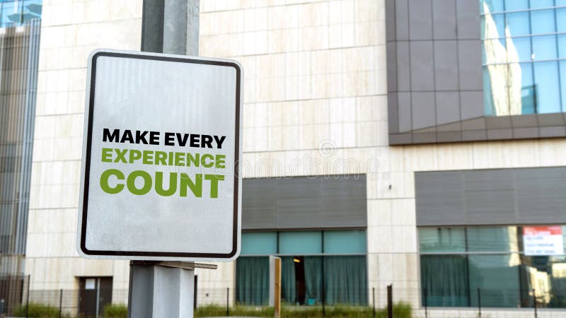 Make Every Experience Count on a Sign in Downtown City Setting Stock ...