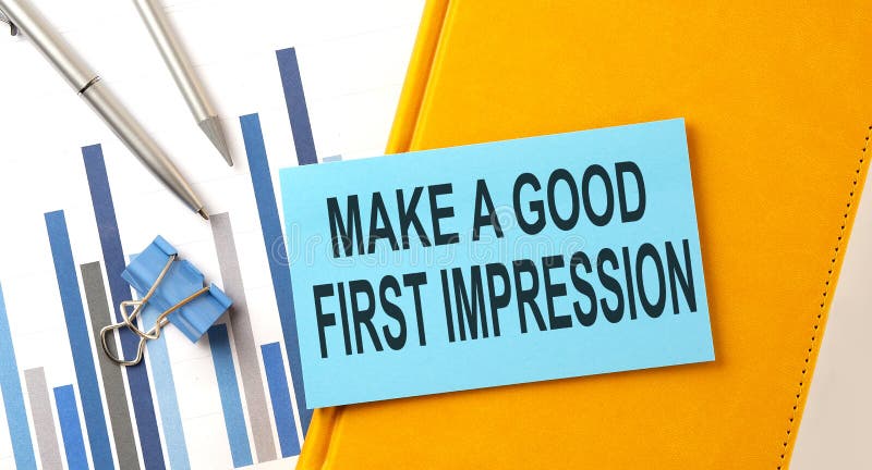 Make a First Good Impression Message on Blue Sticker on Notebook with ...