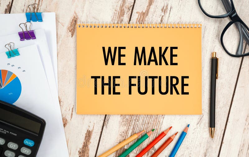 We Make the Future is Written on a Notepad on an Office Desk Stock ...