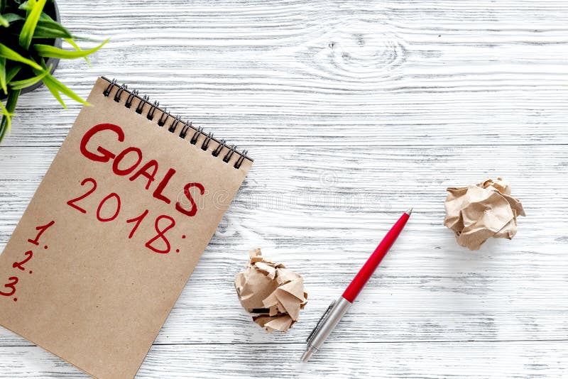 Make a Goals List for 2018. Notebook, Pen and Wrinkled Sheets of Paper ...