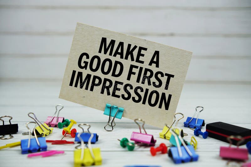 Make a Good First Impression Text on Paper Card with Stationary on ...