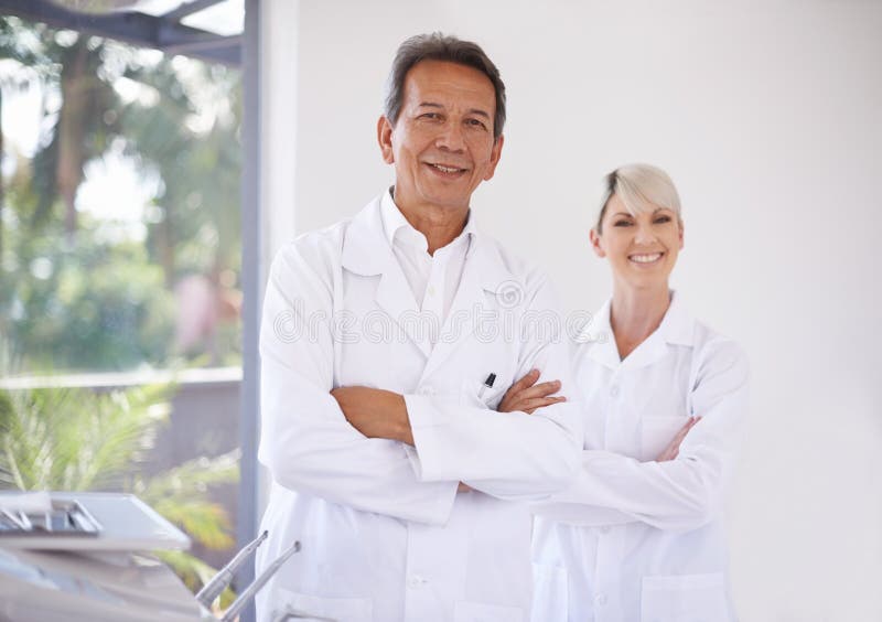 They Make a Great Dentistry Team. Portrait of a Dentist and His ...