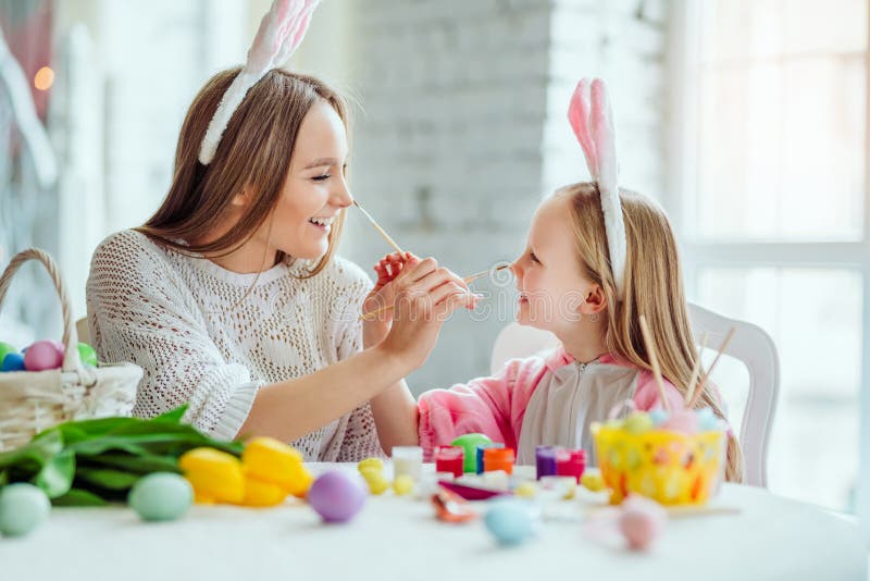 Make a Holiday Child.Mom and Daughter are Preparing for Easter Together ...