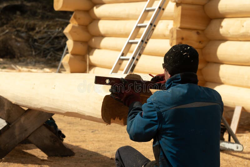 Build a House from Logs. Preparation of Logs for the Assembly of the ...