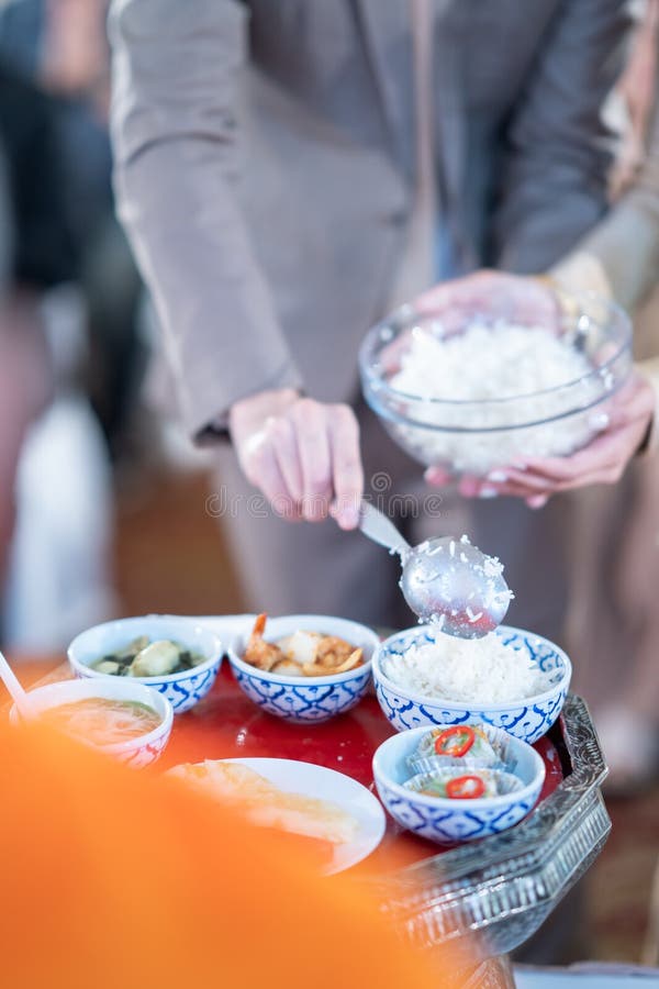 Make Merit in the Buddhist Ceremony in Thai Traditional Wedding Stock ...