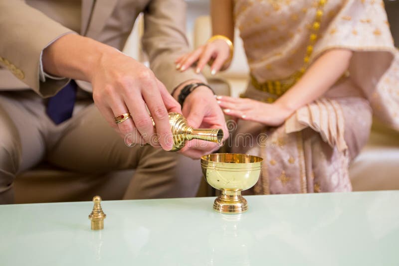 Make Merit in the Buddhist Ceremony in Thai Traditional Wedding Stock ...