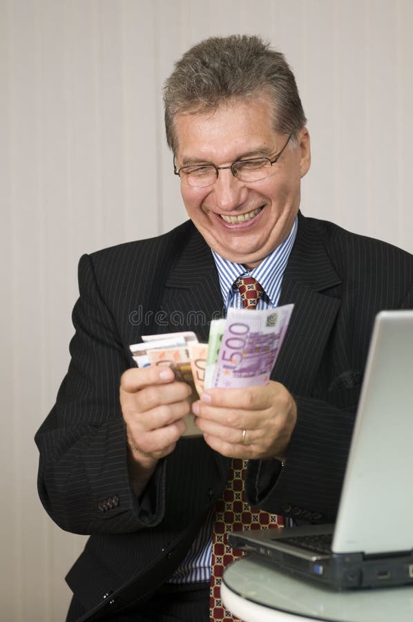 Make money with computer ! stock photo. Image of laptop - 10969128