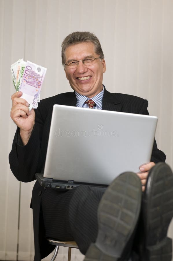 Make money with computer ! stock photo. Image of remote - 10969208