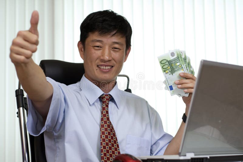 Make money with computer ! stock photo. Image of remote - 11415876