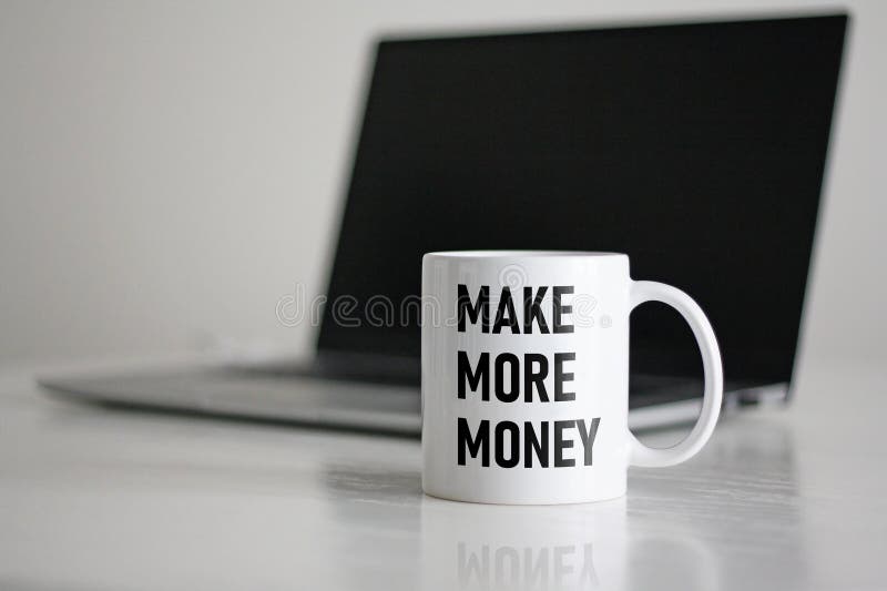 Make More Money is Shown Using the Text on the White Cup Stock Image ...