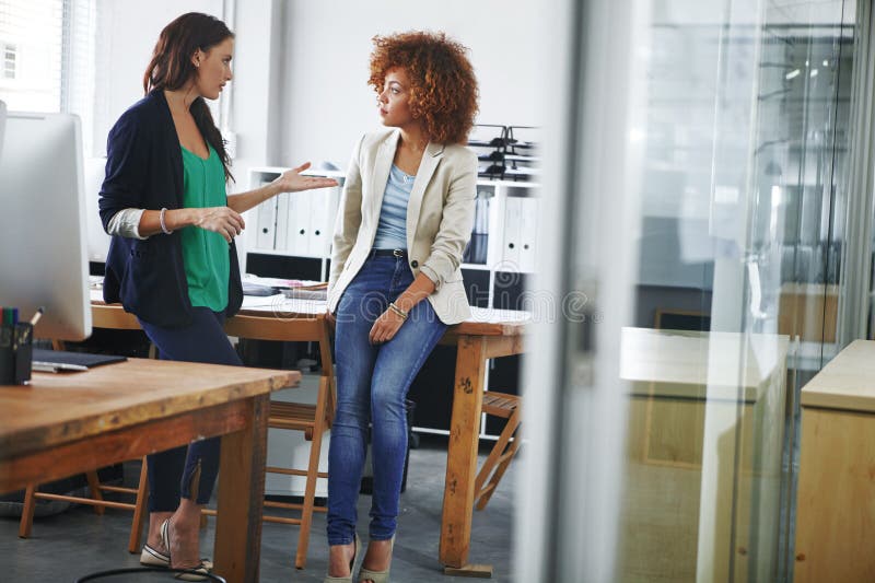 Make that Office Connection. Two Businesswomen Having a Friendly ...