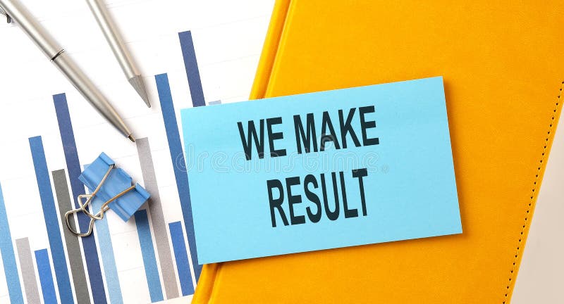We MAKE RESULT Text on Sticker on the Yellow Notebook with Chart and ...