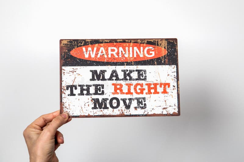 Make the Right Move. Warning Sign with Text in the Hands of a Woman ...