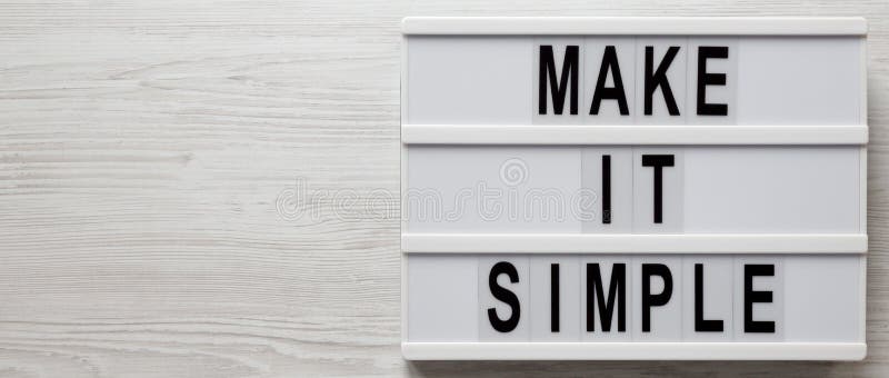 `Make it Simple` Words on a Lightbox on a White Wooden Surface ...