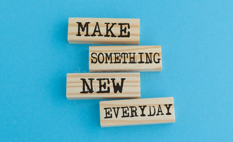Make Something New Everyday Text on Wooden Block on Blue Background ...