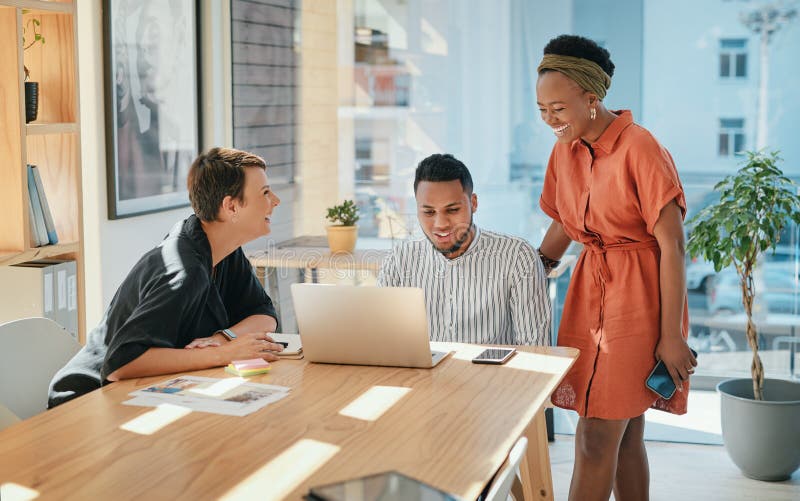 We Make Such a Great Team. a Diverse Group of Businesspeople Having a ...