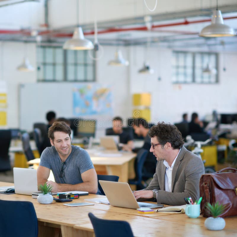 We Make Technology Work for Us. Business Colleagues Discussing Matters ...