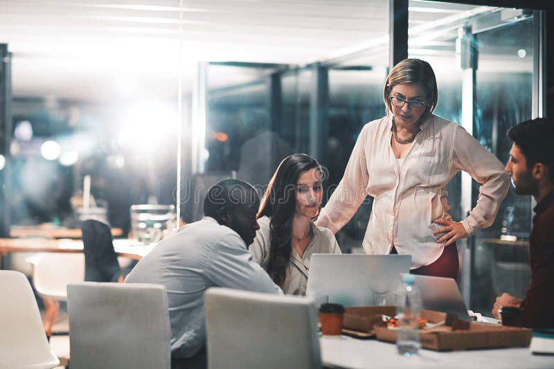 That Make Things Happen Mindset. Colleagues Using a Laptop Together ...