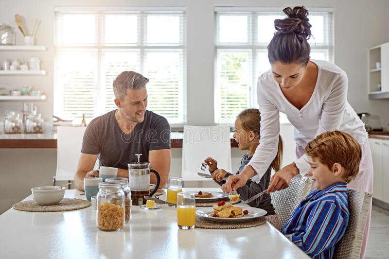 They always Make Time To Bond. a Family Having Breakfast Together ...