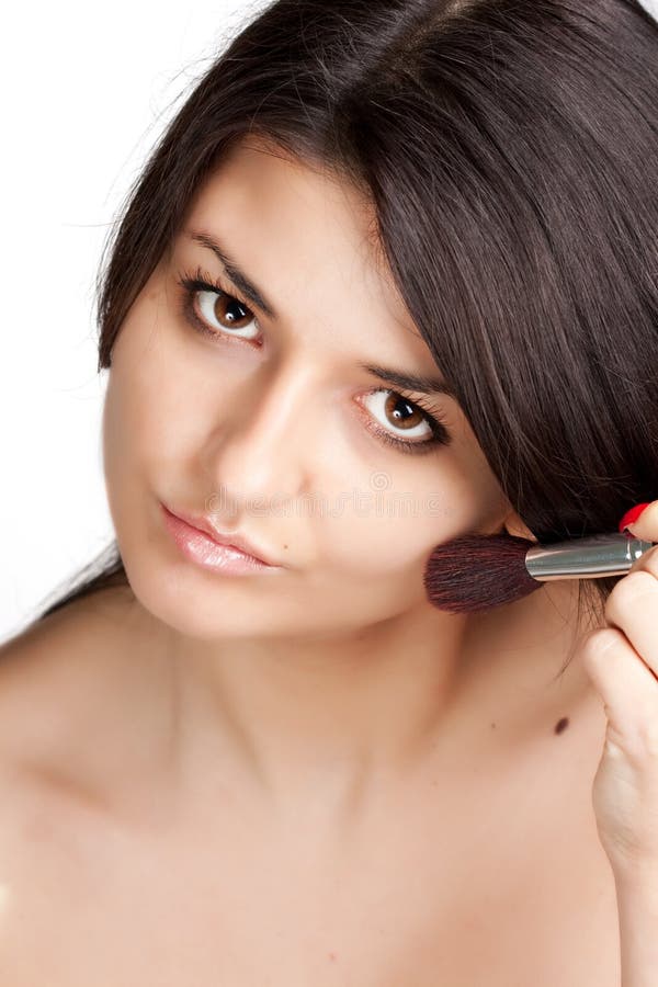 Putting makeup stock image. Image of girl, cosmetic, beautiful - 12721969