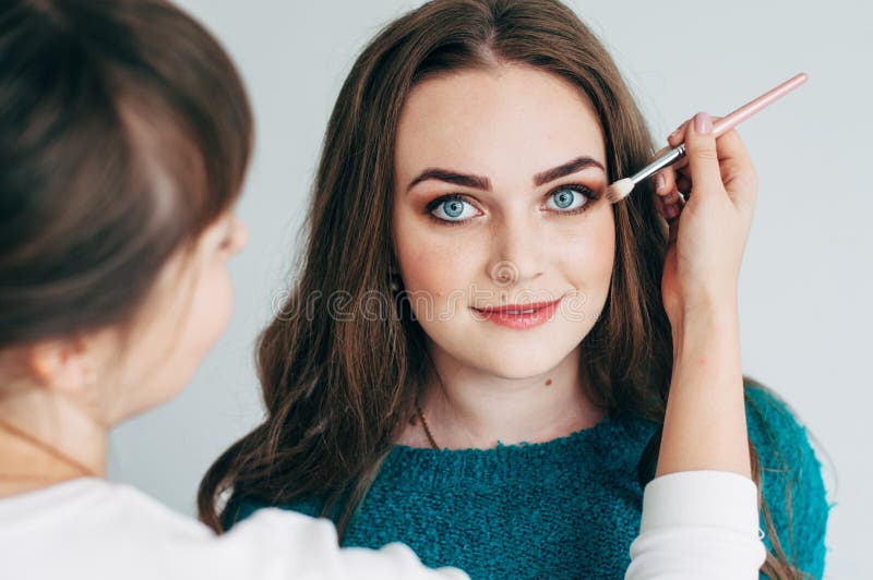 Make-up Artist Does the Make-up of the Girl Stock Photo - Image of lady ...