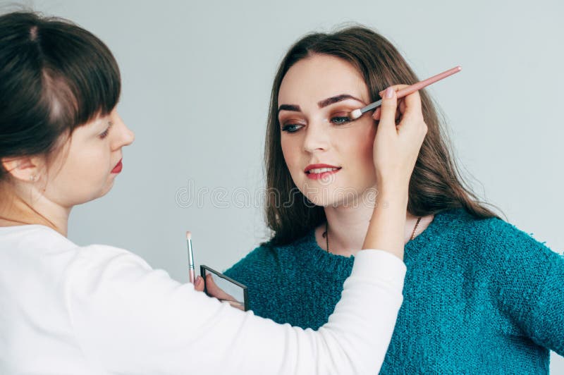 Make-up Artist Does the Make-up of the Girl Stock Image - Image of ...