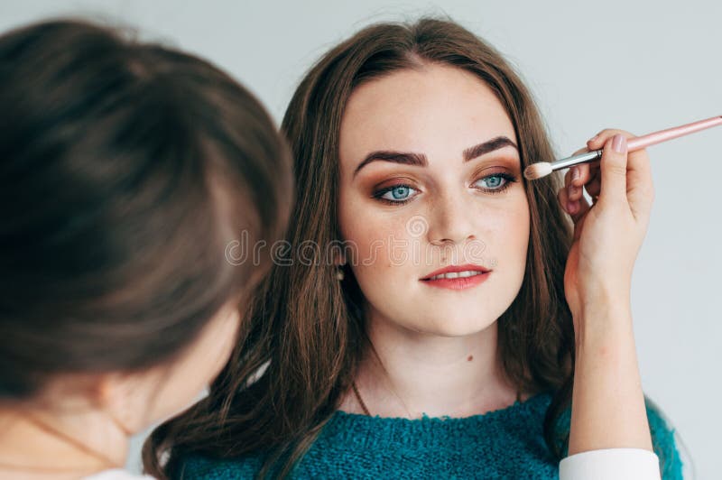 Make-up Artist Does the Make-up of the Girl Stock Photo - Image of ...