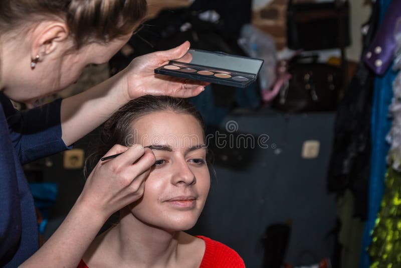 Make-up Artist Doing the Make-up for Nice Girl Stock Image - Image of ...